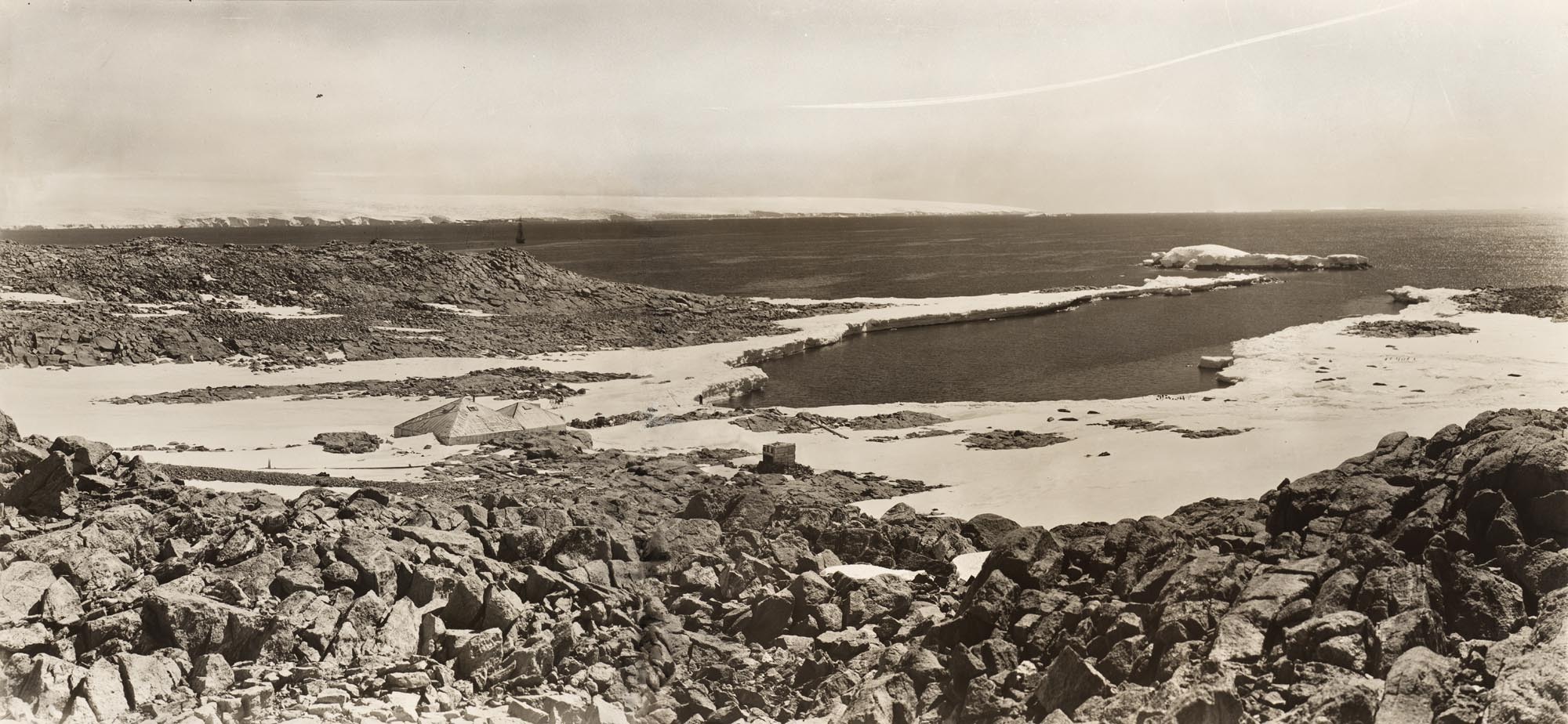 A panoramic view of Cape Denison, showing the Winter Quarters of the ...